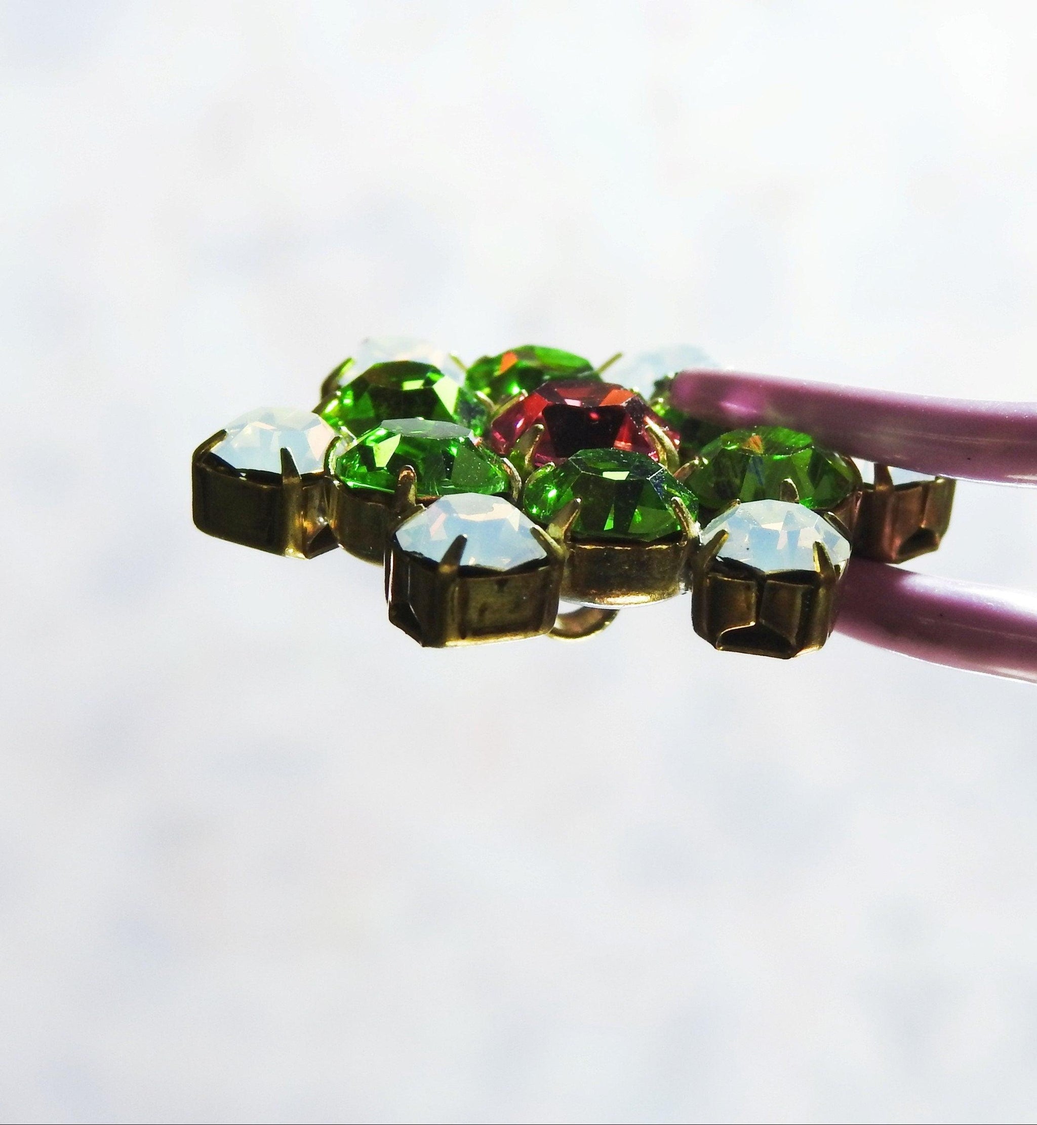 Green crystal glass button